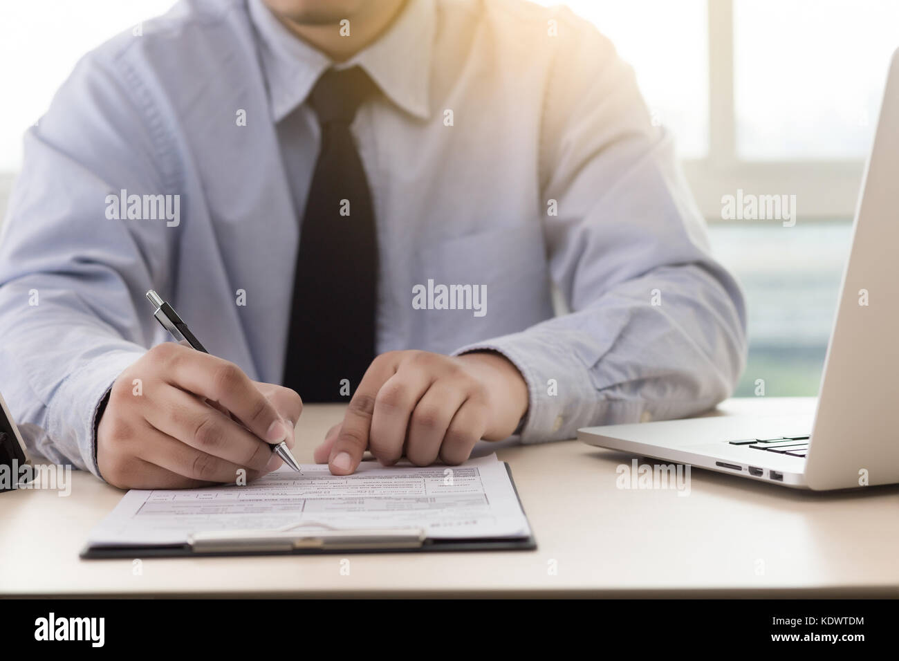 Businessman working reading documents graph financial to job succes ...