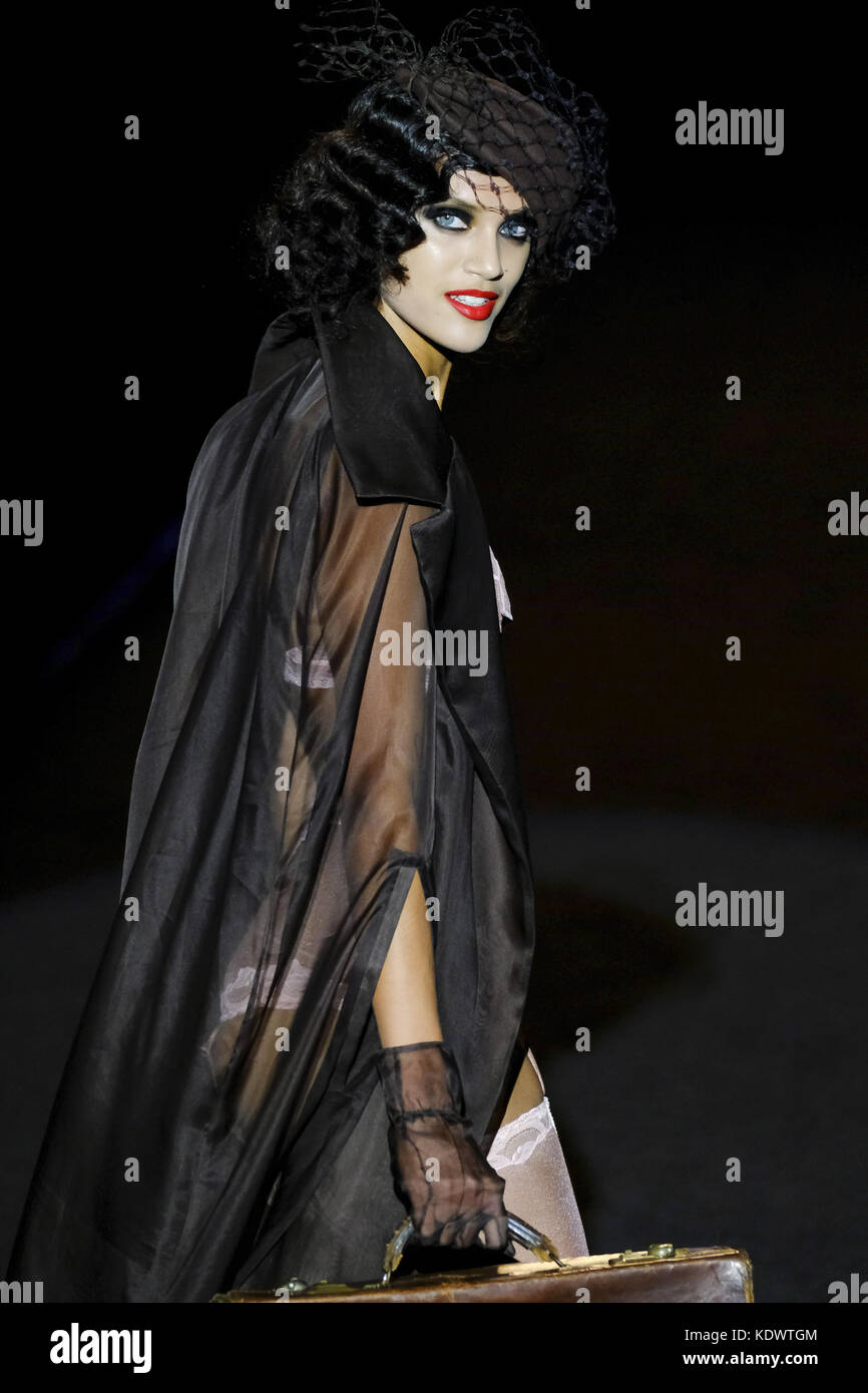 A model takes to the catwalk with a creation for Spring/Summer 2018 ...