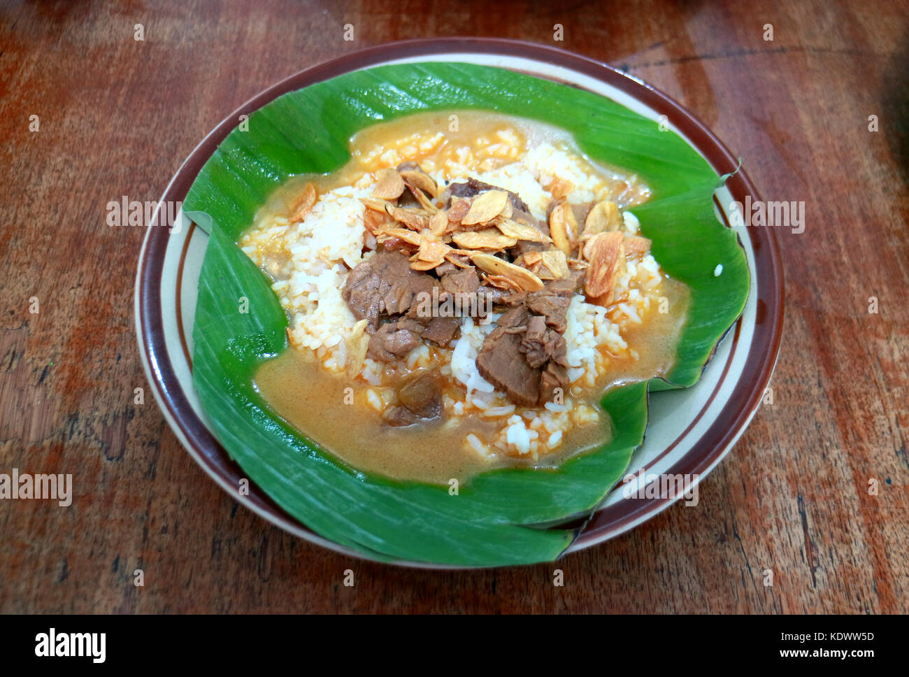 Nasi gandul. Traditional food from Pati, Central Java, Indonesia ...