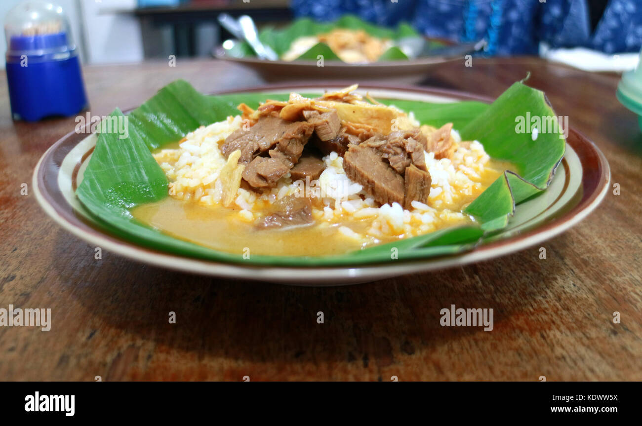 Nasi gandul. Traditional food from Pati, Central Java, Indonesia ...