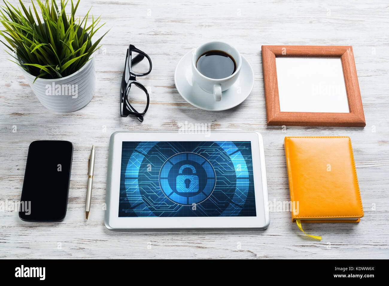 Web security and technology concept with tablet pc on wooden table ...