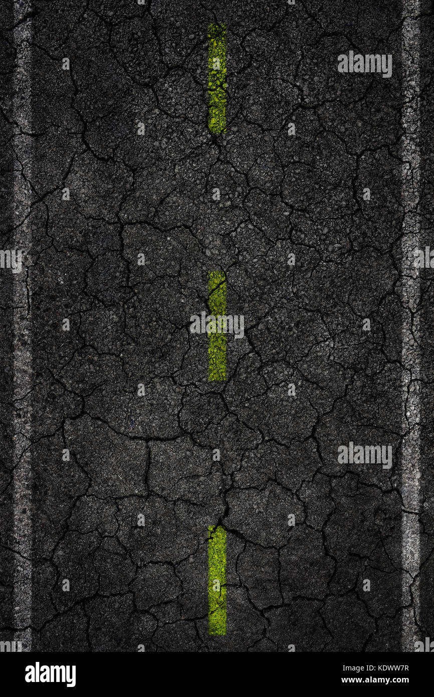 Crack road texture with two white stripes and dashed yellow stripe ...