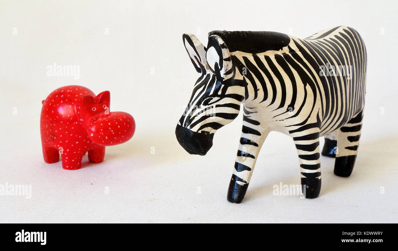 Toy zebra and hippo Stock Photo - Alamy