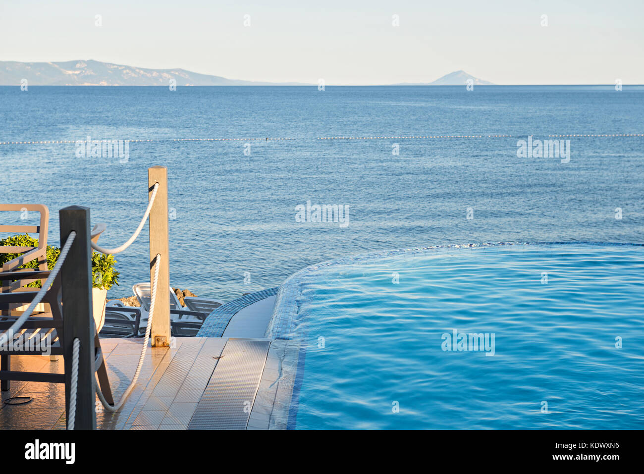 Azul infinity pool on the sunset Stock Photo - Alamy