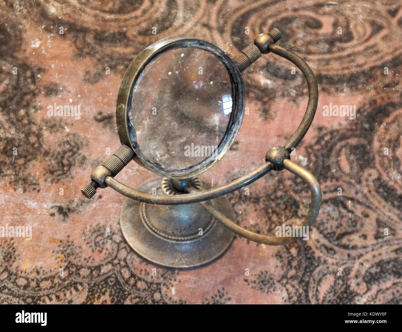 Vintage magnifier loupe standing on a table - Selective focus Stock ...