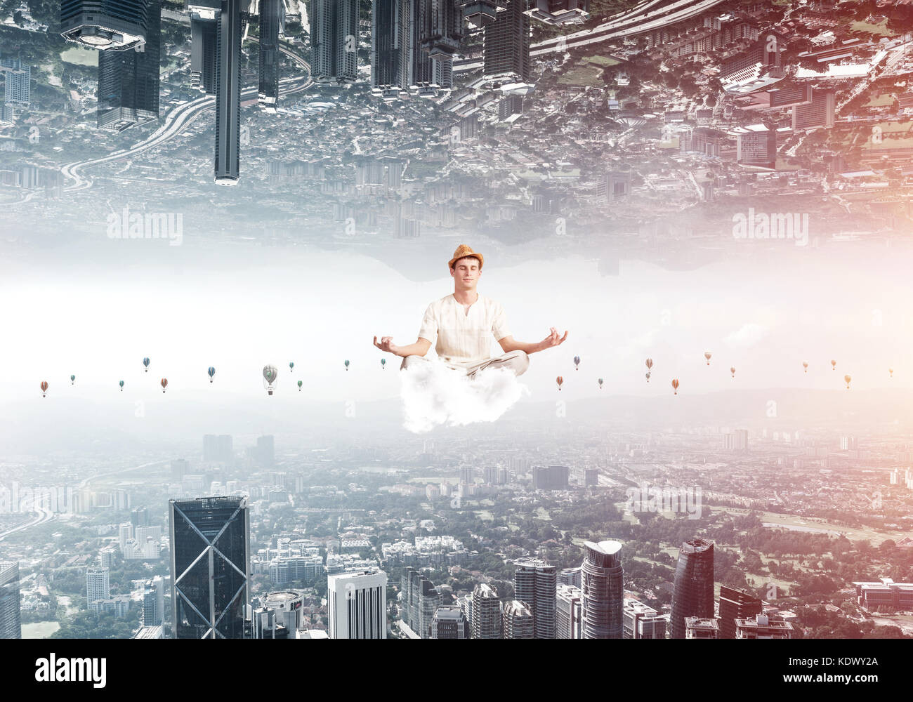 Young man keeping mind conscious Stock Photo - Alamy