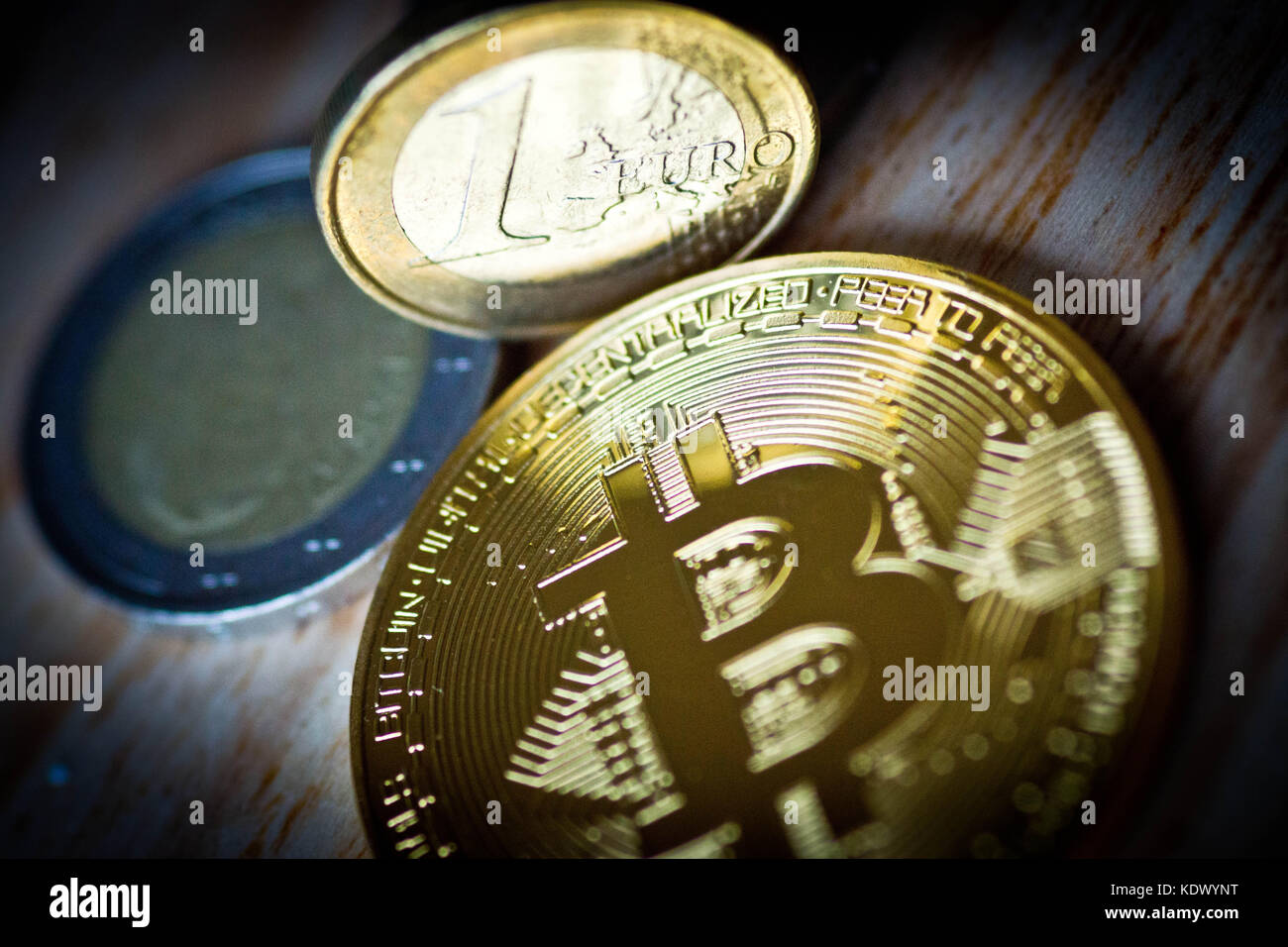 Bitcoin replica and Euro coins Stock Photo - Alamy