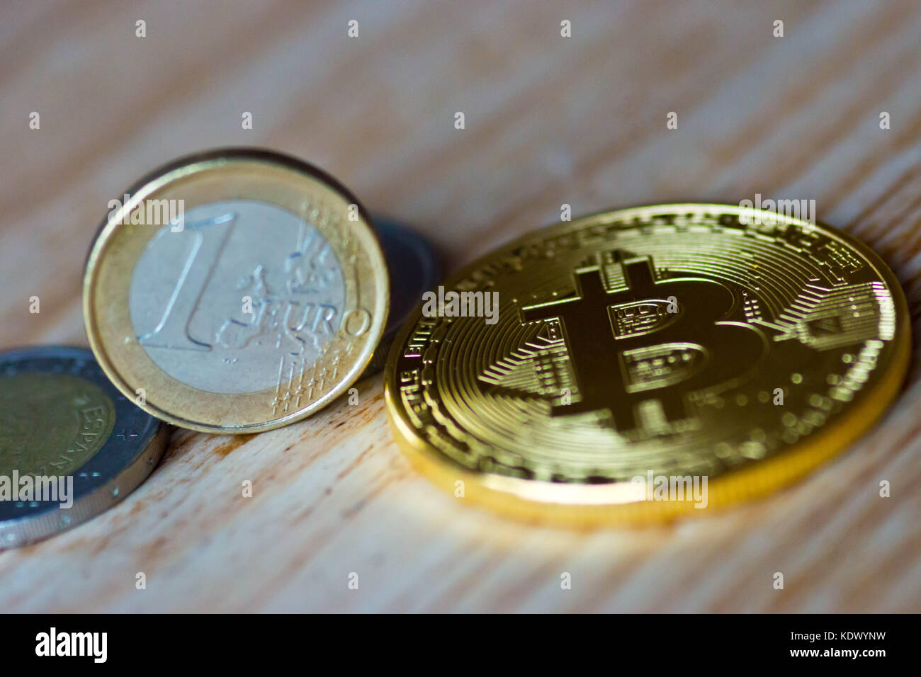 Bitcoin replica and Euro coins Stock Photo - Alamy