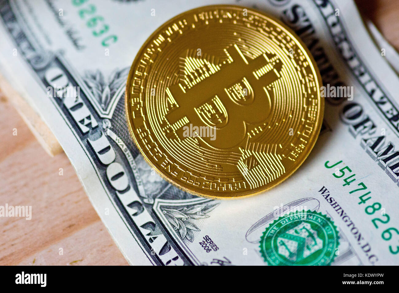 Bitcoin replica on a one dollar bill Stock Photo - Alamy