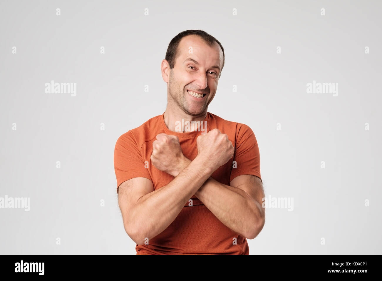 Hand in front of chest hi-res stock photography and images - Alamy