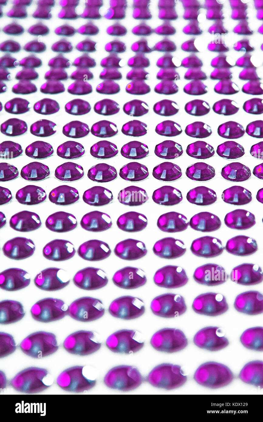 Purple rhinestones as design background Stock Photo - Alamy