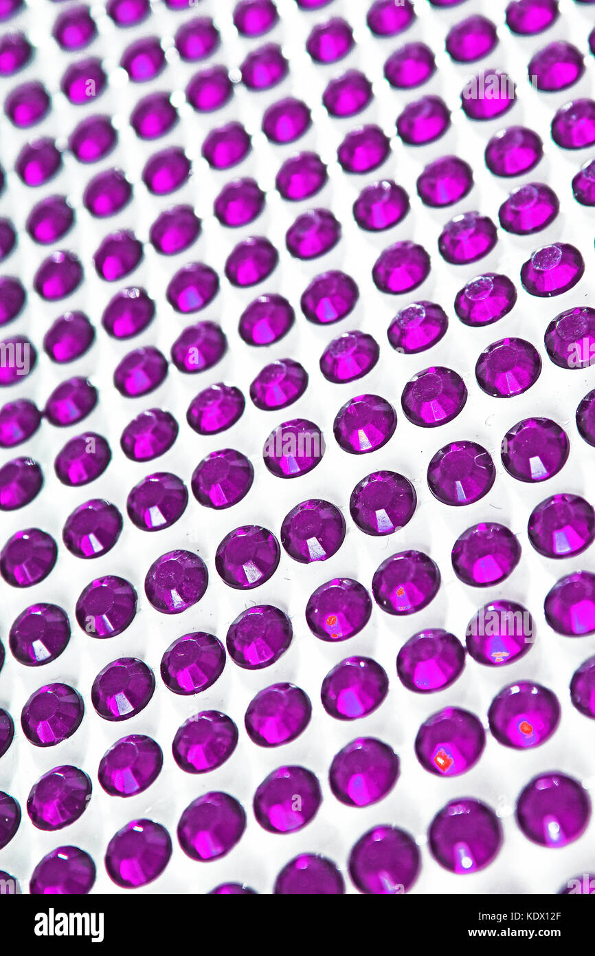Purple rhinestones as design background Stock Photo - Alamy