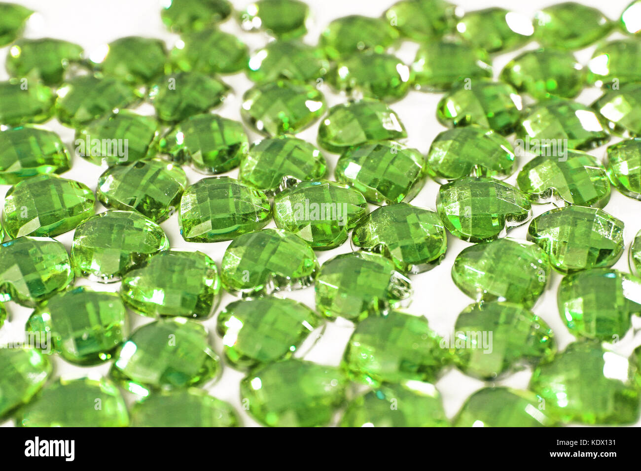 Green rhinestones on white background. Rhinestone closeup pattern Stock ...