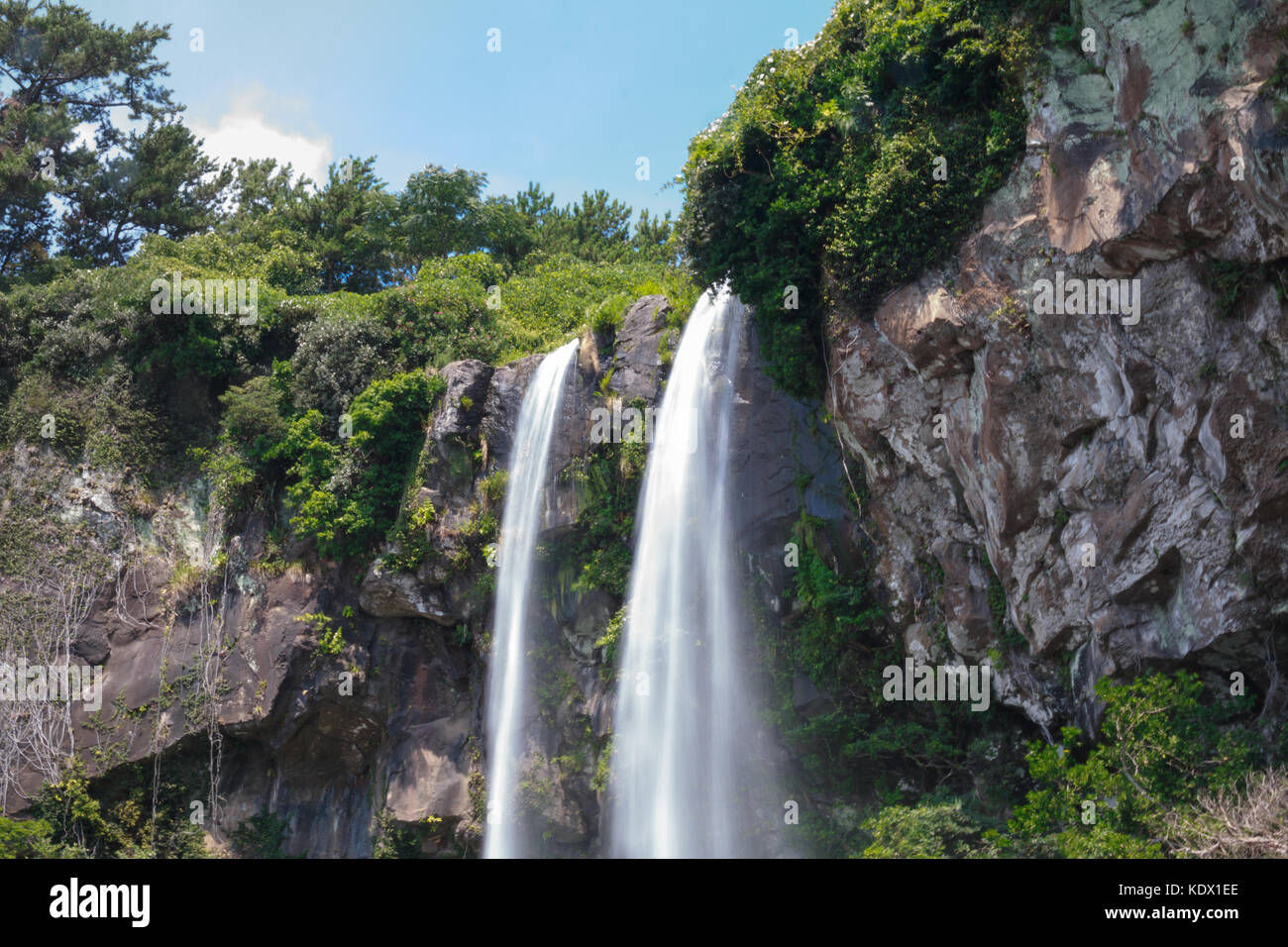 Jeongbang waterfall one of the famous travel destination in Jeju Island ...