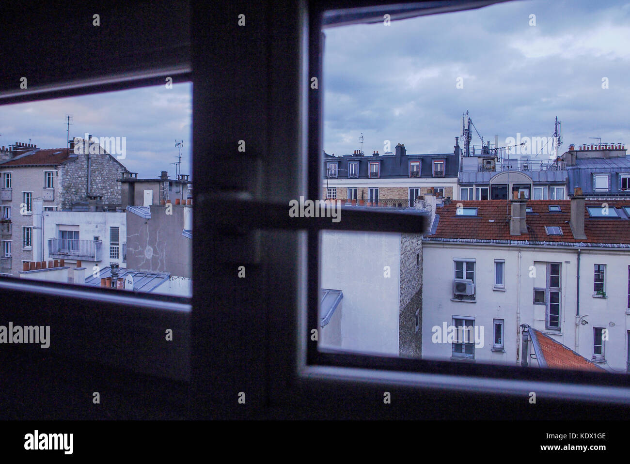 Roofscape seen from a window, Paris, France Stock Photo - Alamy