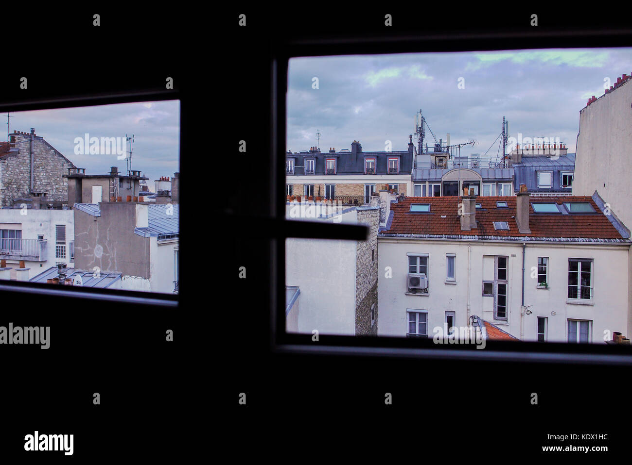 Roofscape seen from a window, Paris, France Stock Photo - Alamy