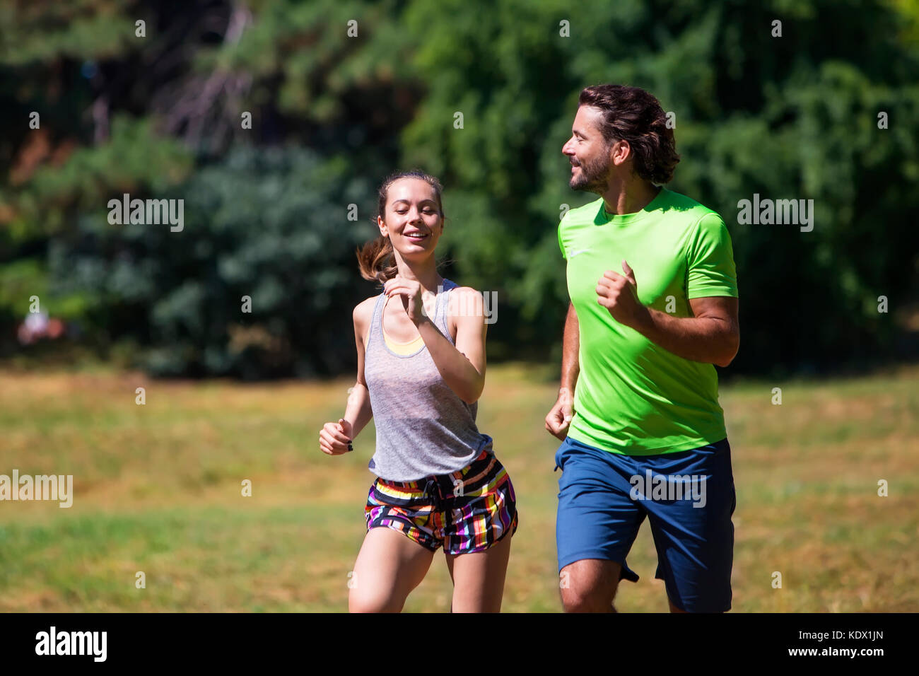 Couple running together outdoor hi-res stock photography and images - Alamy