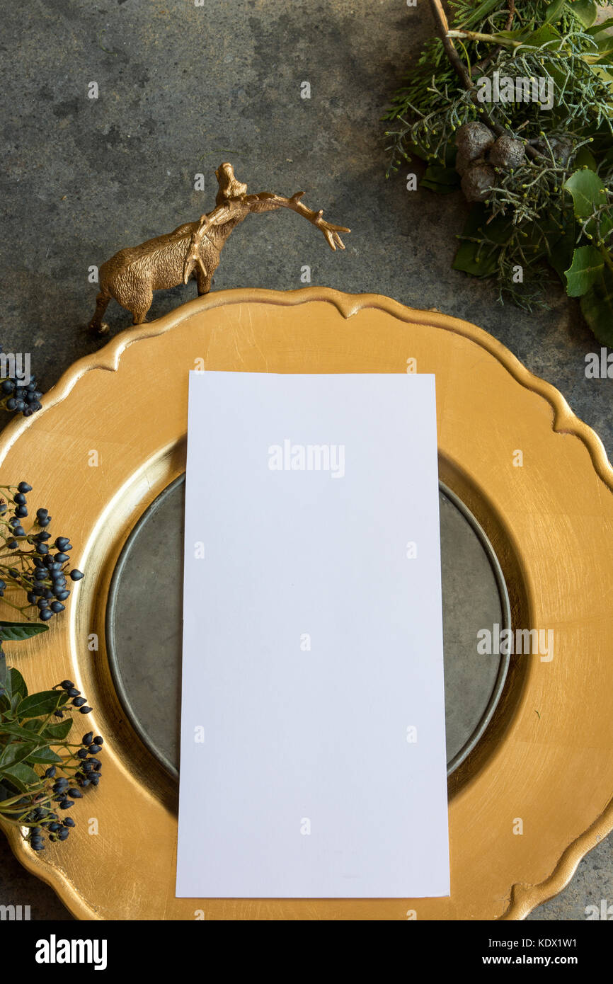 Gold place setting with empty menu on grunge Stock Photo - Alamy