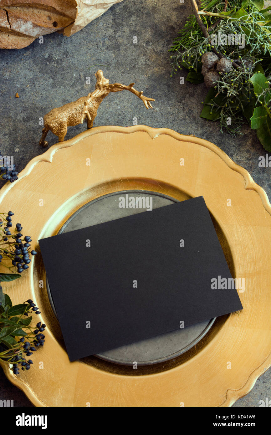 Gold place setting with empty menu on grunge Stock Photo - Alamy
