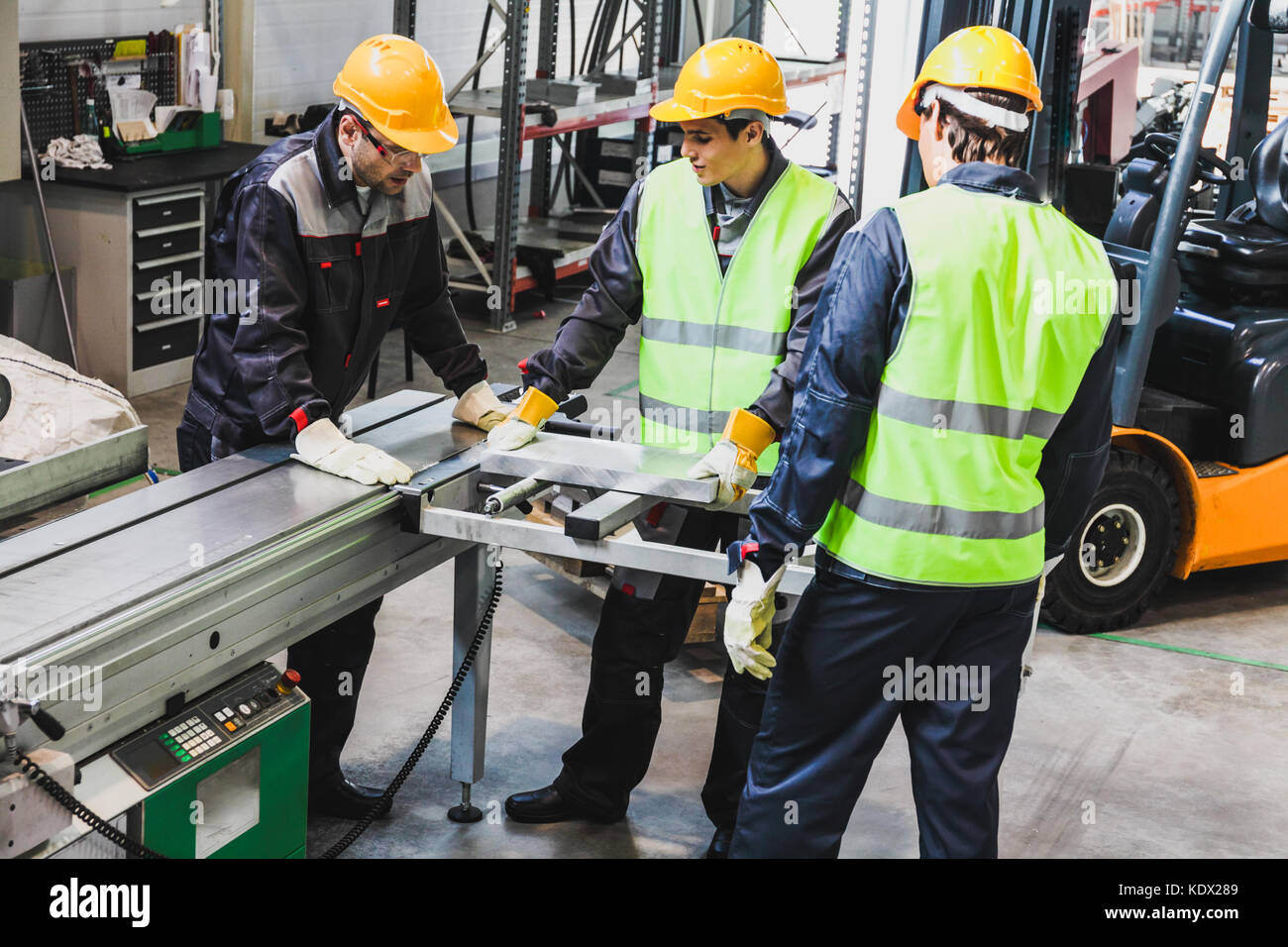 CNC machine shop with lathes, technicians and workers Stock Photo - Alamy