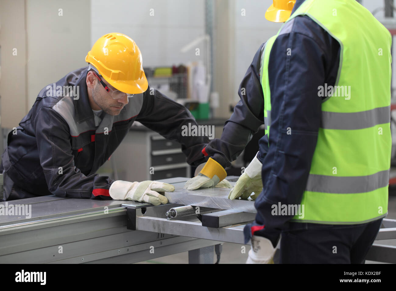 CNC machine shop with lathes, technicians and workers Stock Photo - Alamy