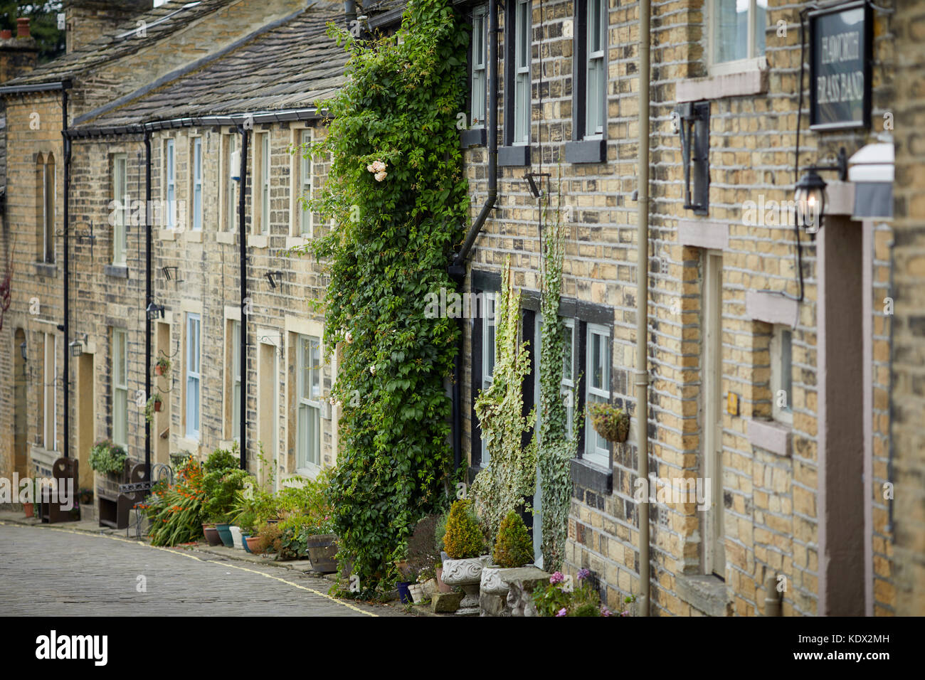 Pennines village, Haworth in West Yorkshire, England. tourists mingle ...