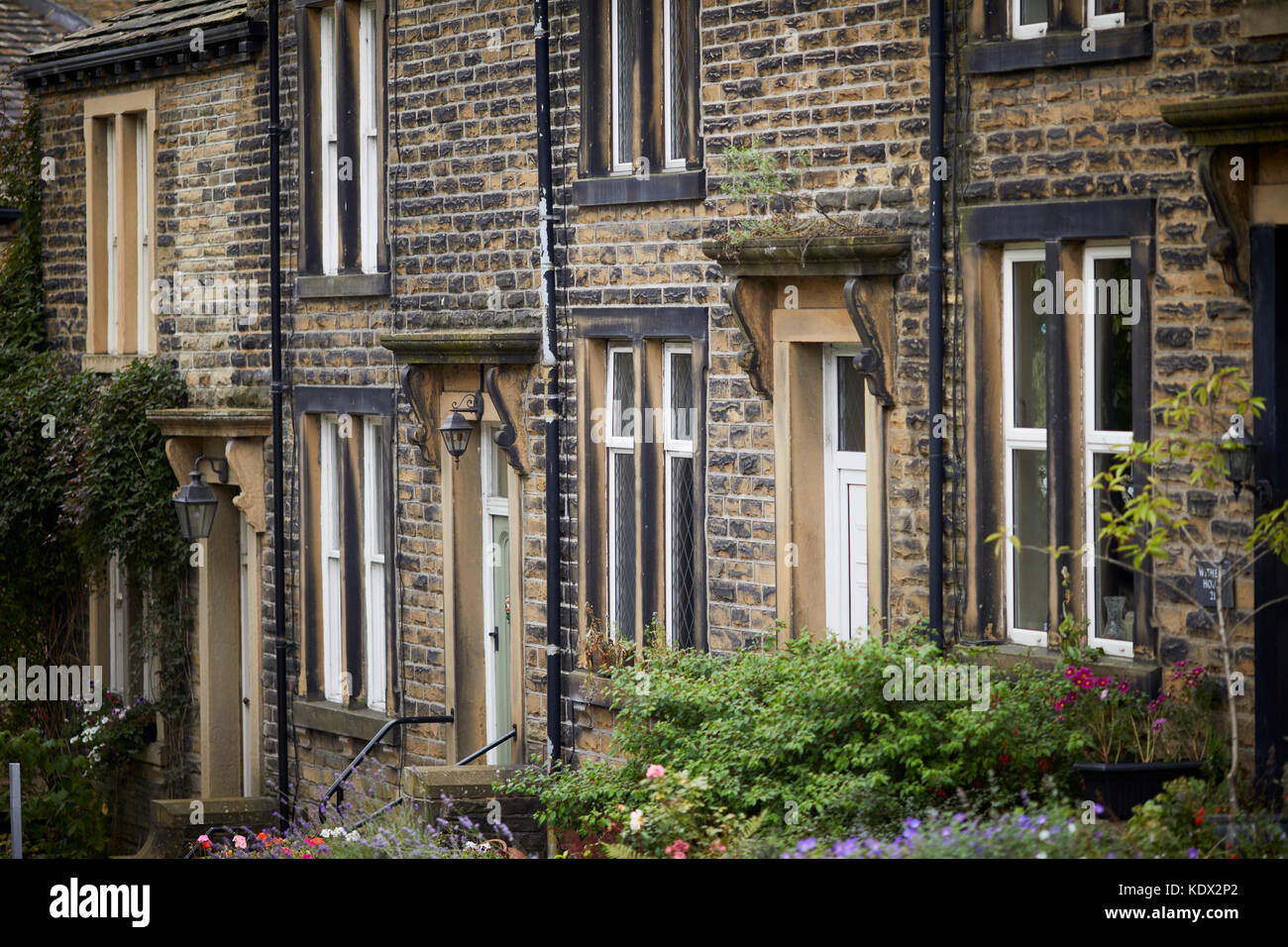 Pennines village, Haworth in West Yorkshire, England. stone terraced ...
