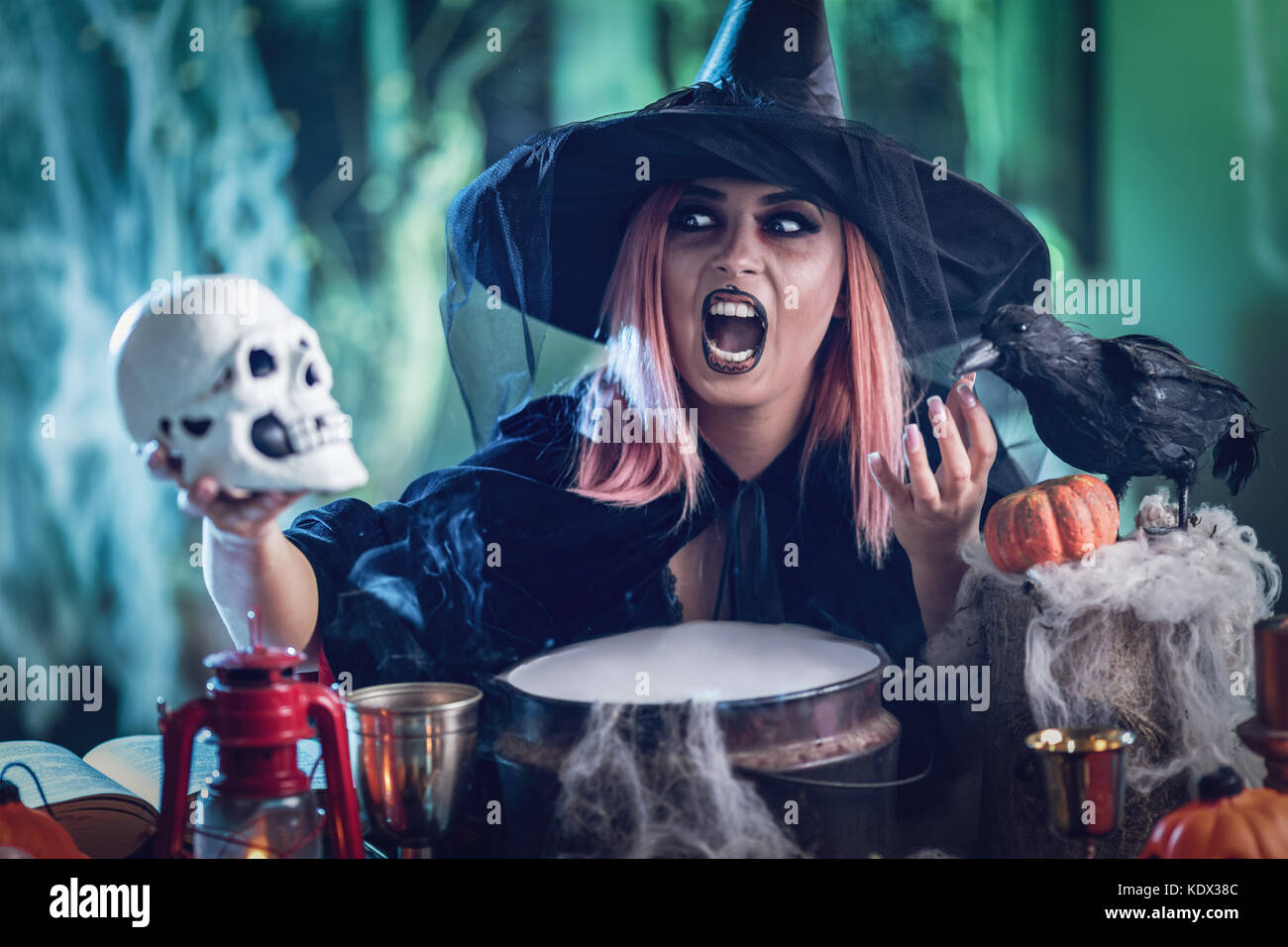 Witch with angry face in creepy surroundings sends messages to dead ...