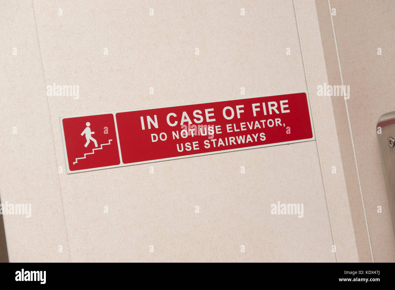 "In Case of Fire" warning sign on a container ship Stock Photo - Alamy