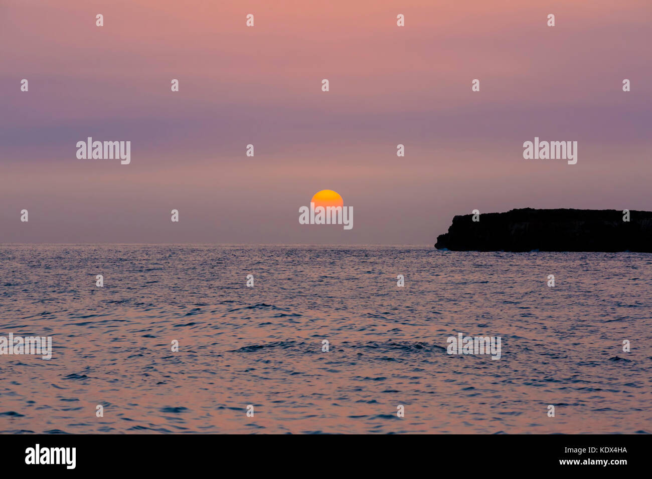 A summer sunrise over the horizon in Malta, the Mediterranean Sea Stock ...