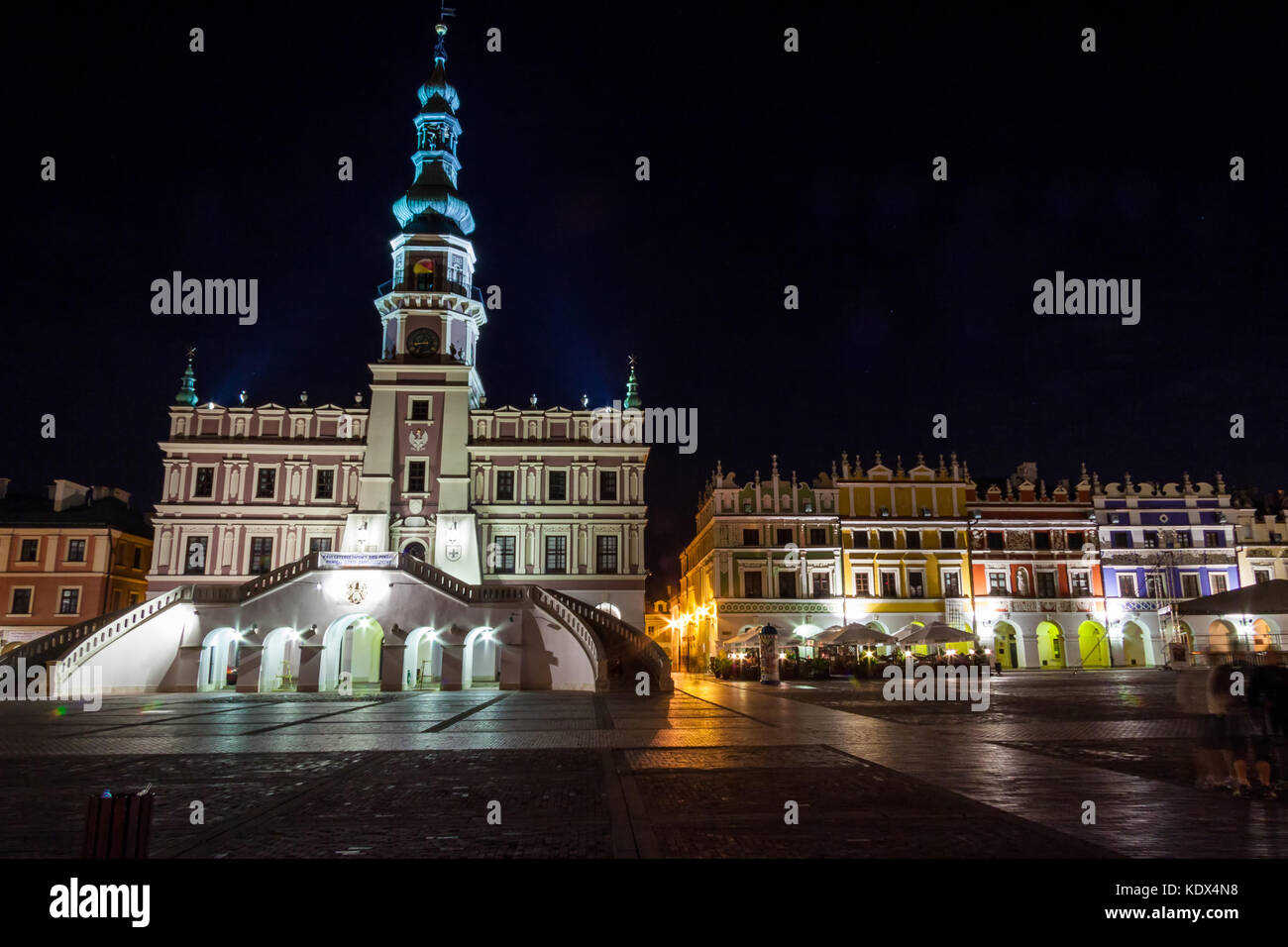 Old town of Zamosc at night. It is on the UNESCO World Heritage List ...