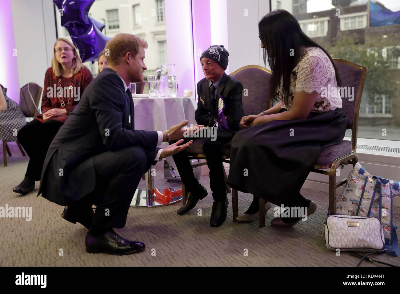 Prince Harry meets Marni Ahmed, aged 9, the winner of the Inspirational ...