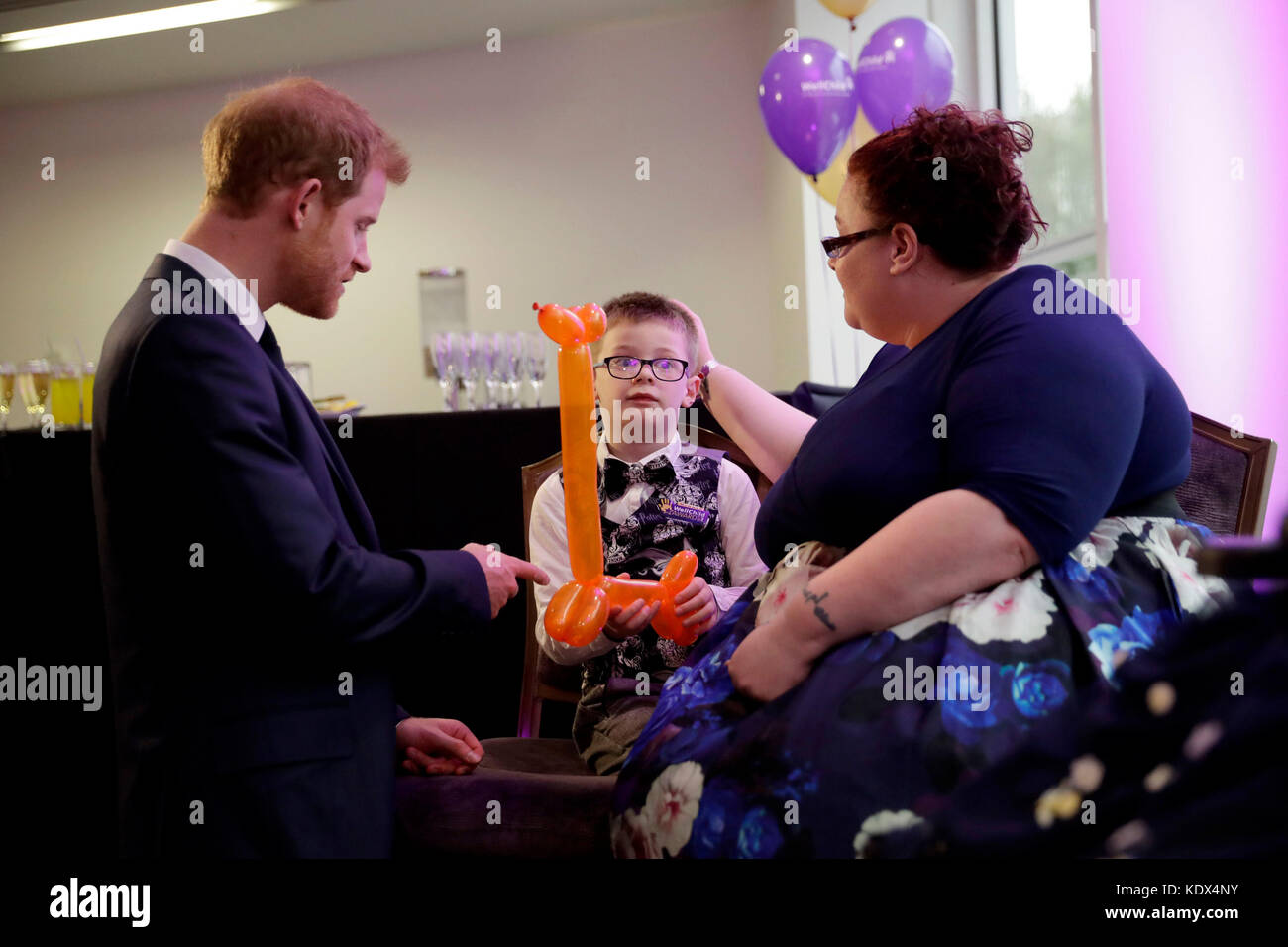 Prince Harry meets Finley Green, aged 7, the winner of the ...
