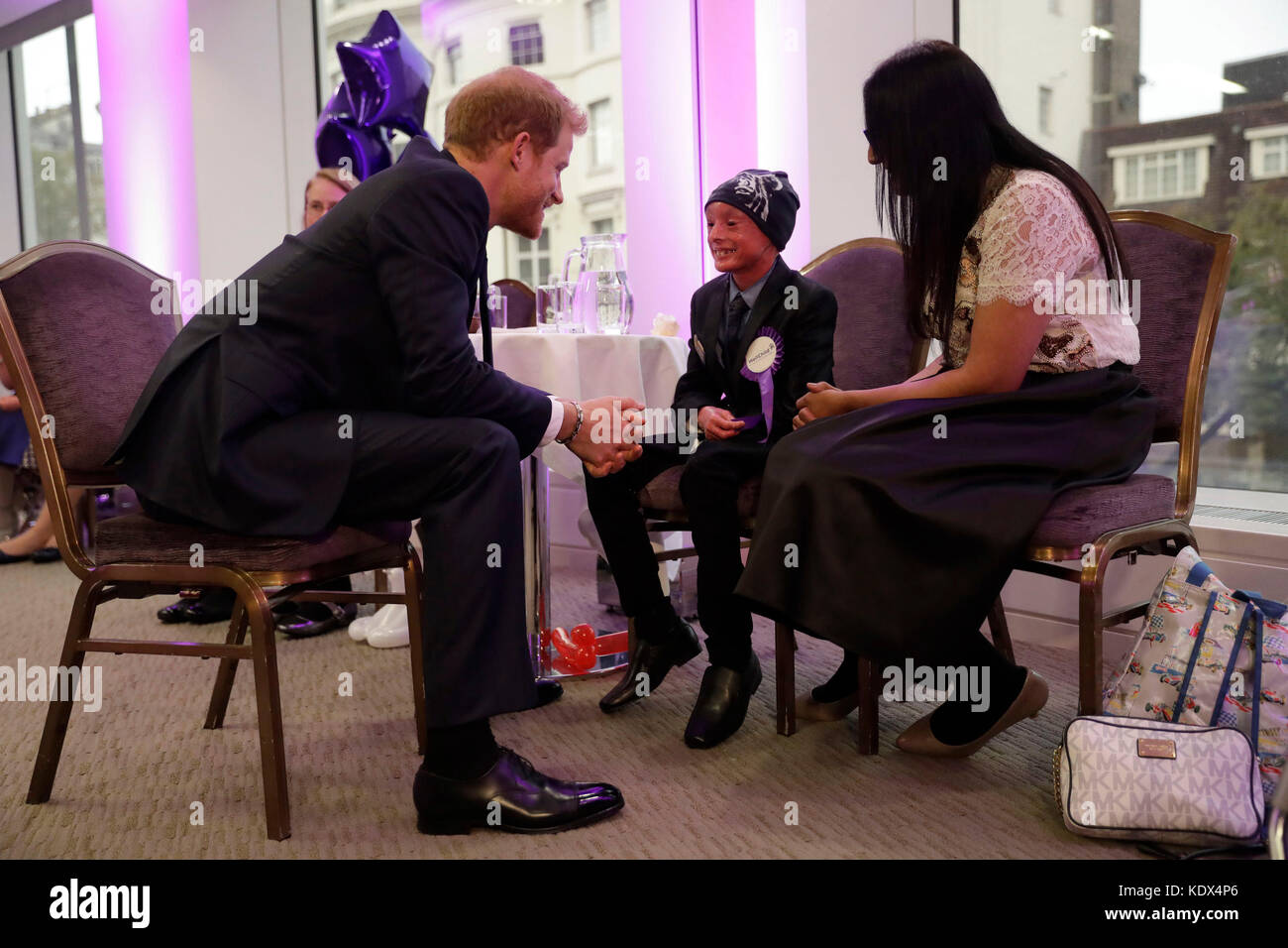 Prince Harry meets Marni Ahmed, aged 9, the winner of the Inspirational ...