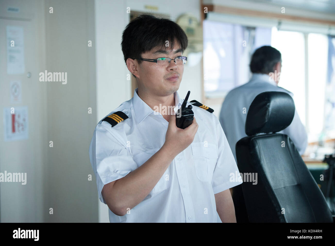 A watch officer on the bridge of a merchant ship Stock Photo - Alamy