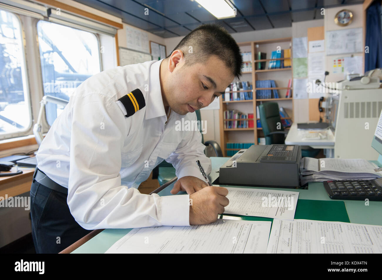 A watch officer on the bridge of a merchant ship Stock Photo - Alamy