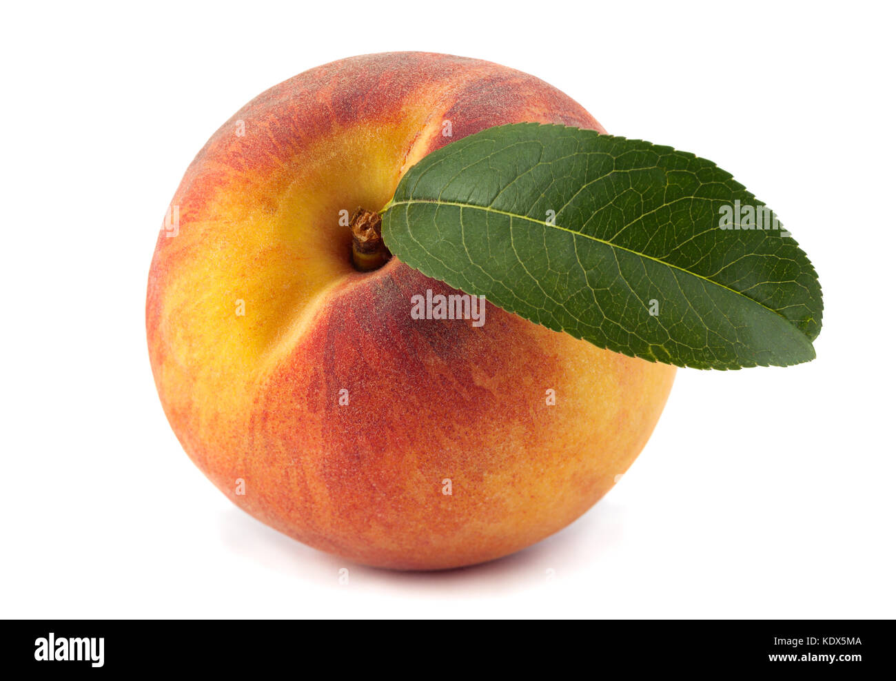 Peach fruit closeup isolated on white background Stock Photo - Alamy