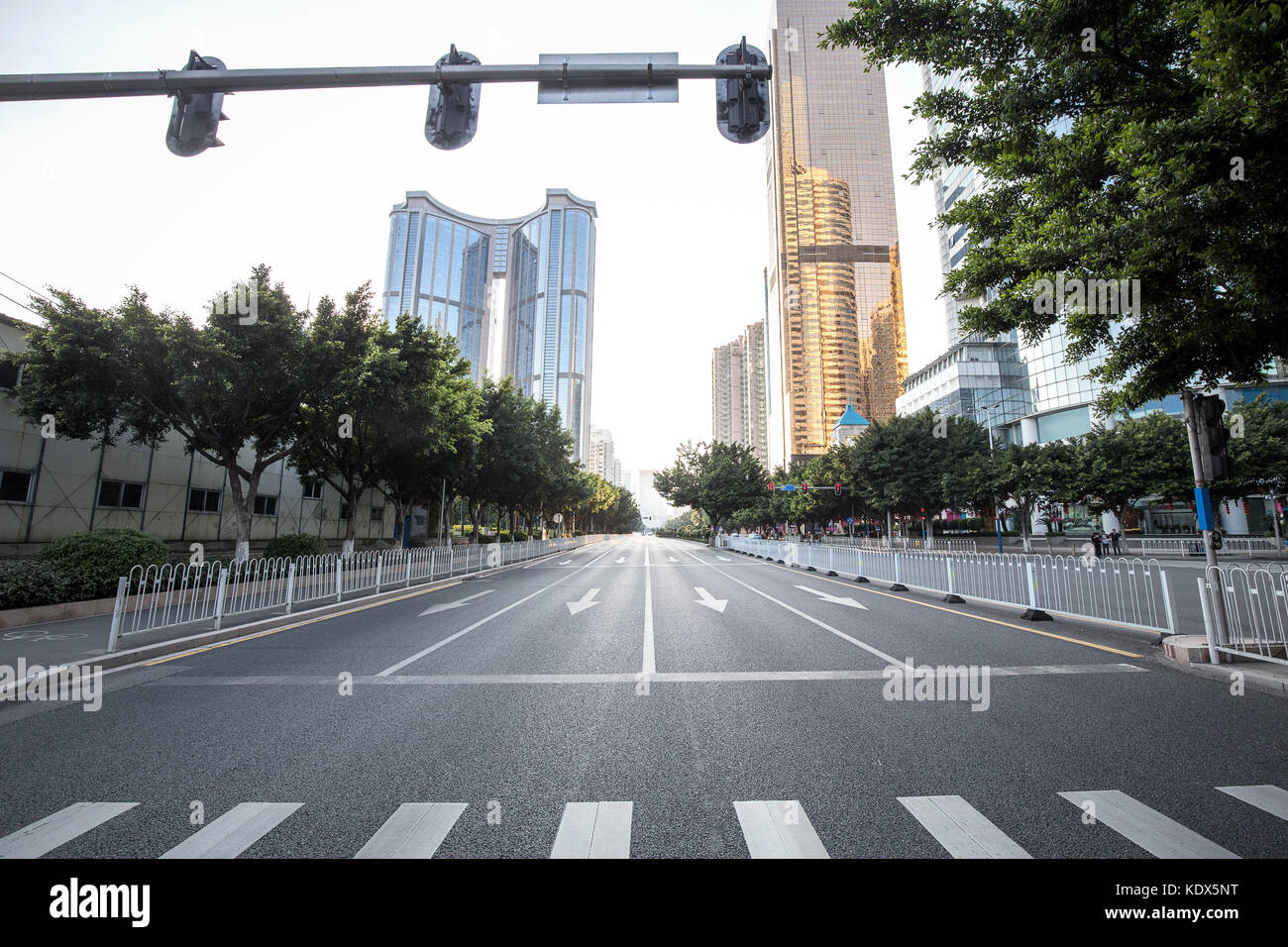 Road with zebra crossing in the city Stock Photo - Alamy