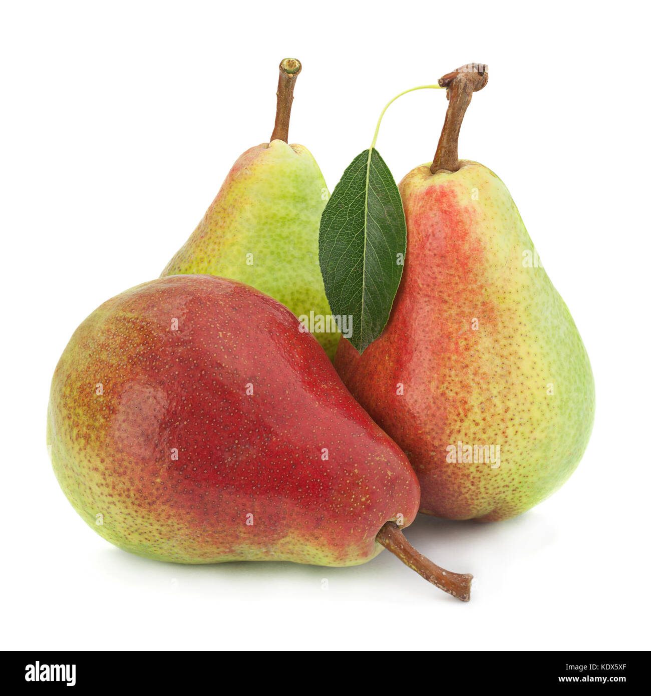 Pear fruit closeup with leaf isolated on white background Stock Photo ...