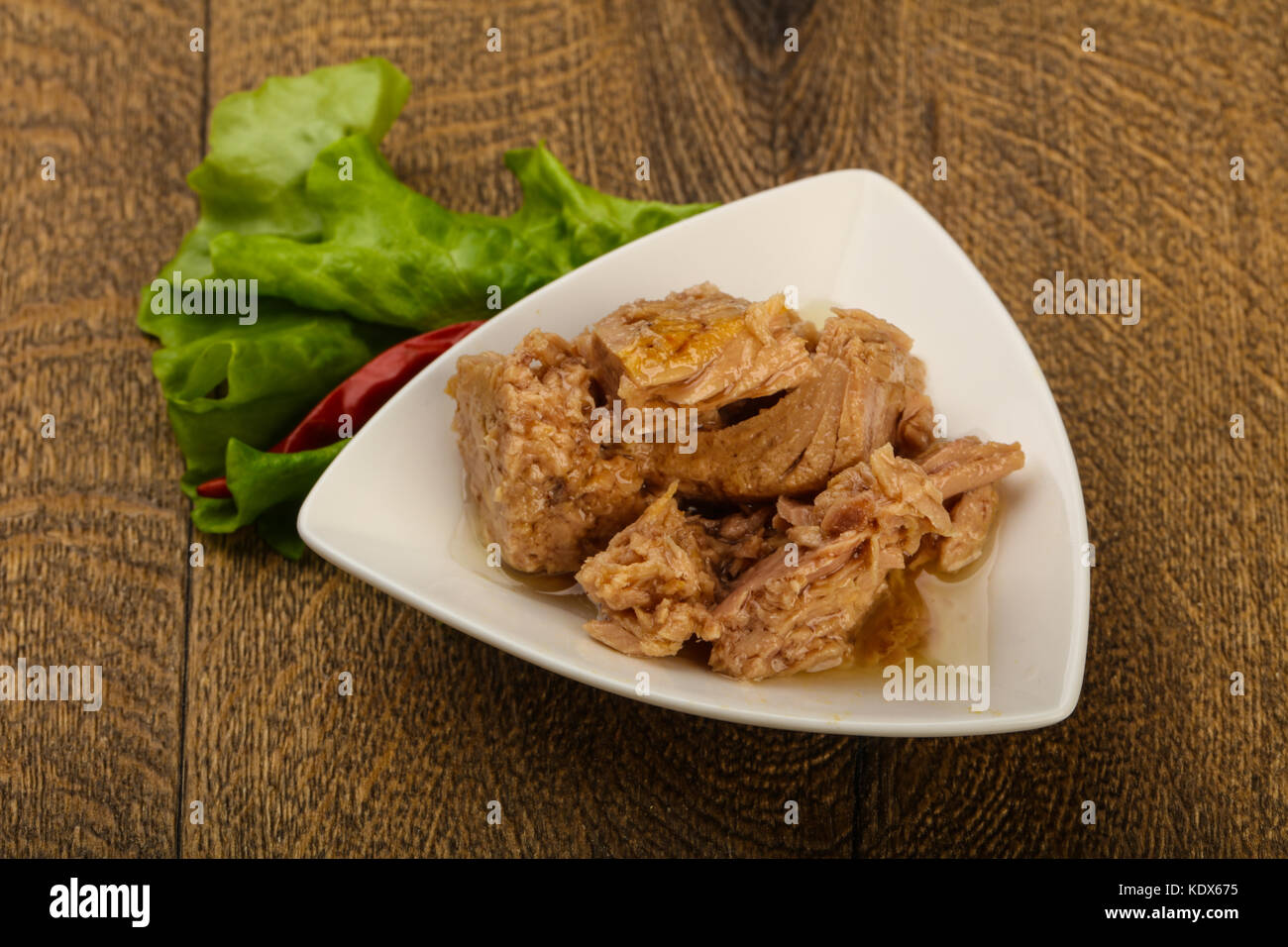 Canned tuna fish in the bowl ready for cooking Stock Photo - Alamy