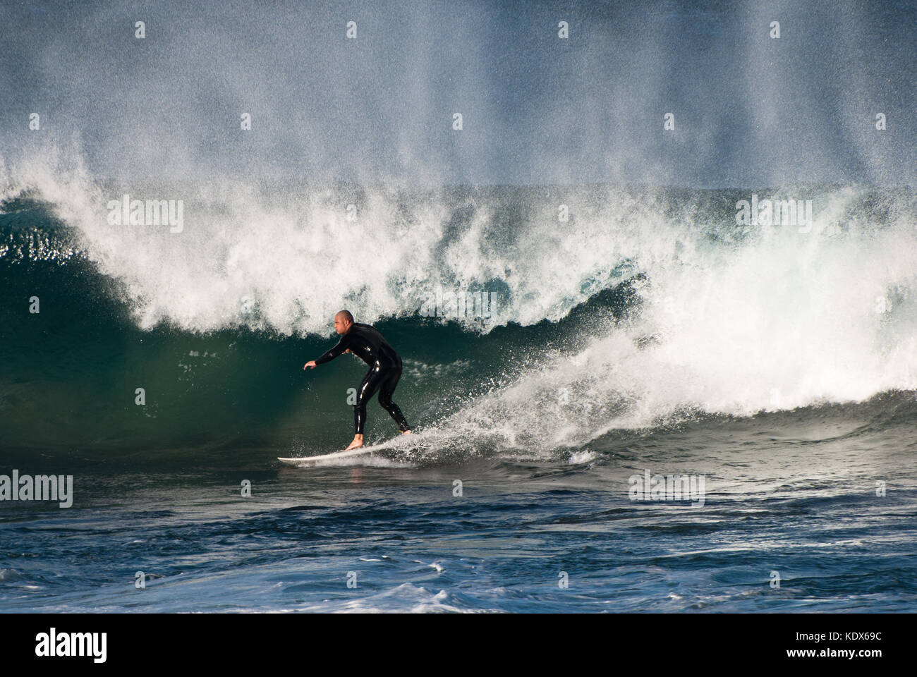 Surfer Under Breaking Wave in Australia Stock Photo - Alamy