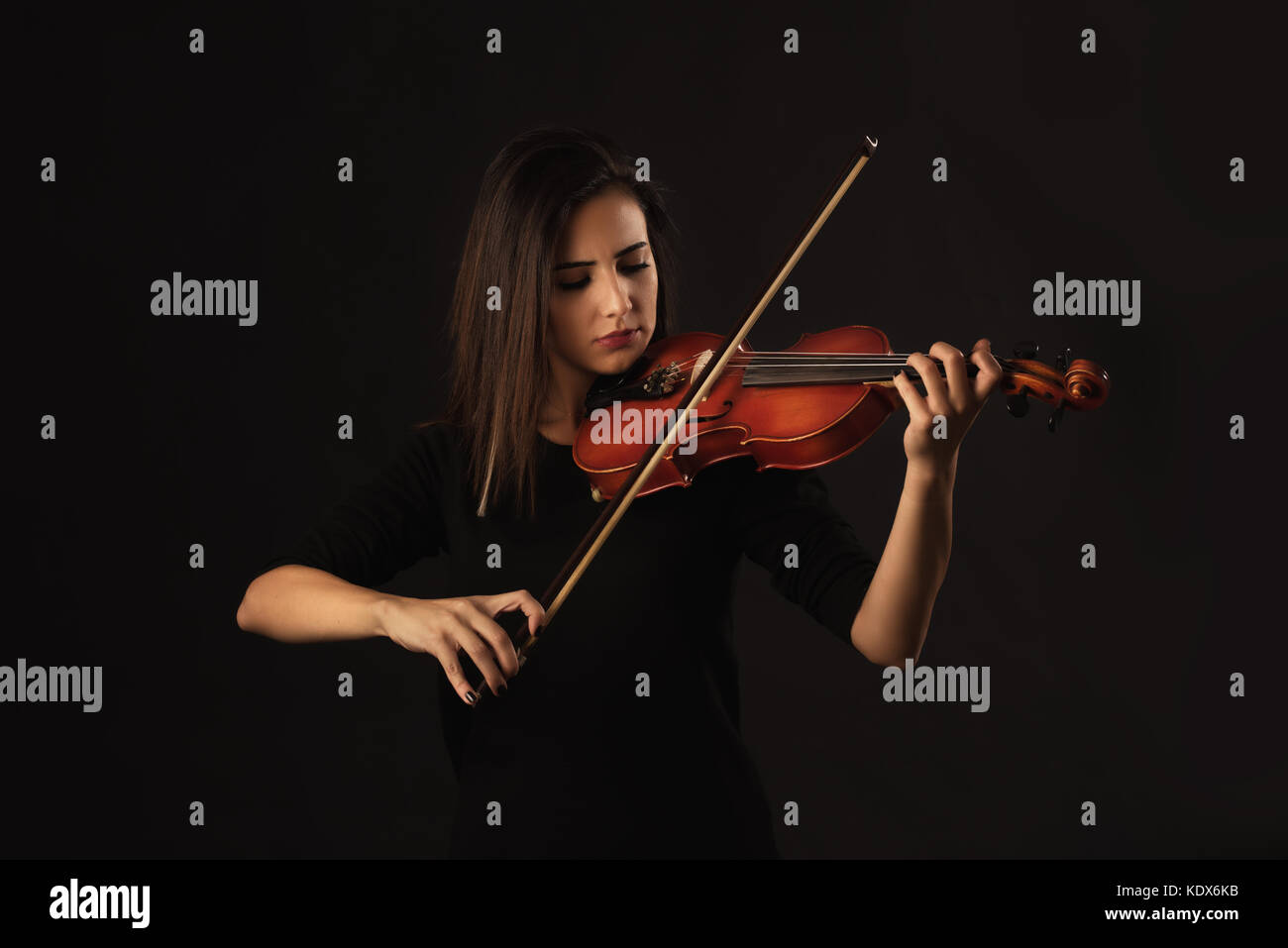 Female playing music instrument concert hi-res stock photography and ...