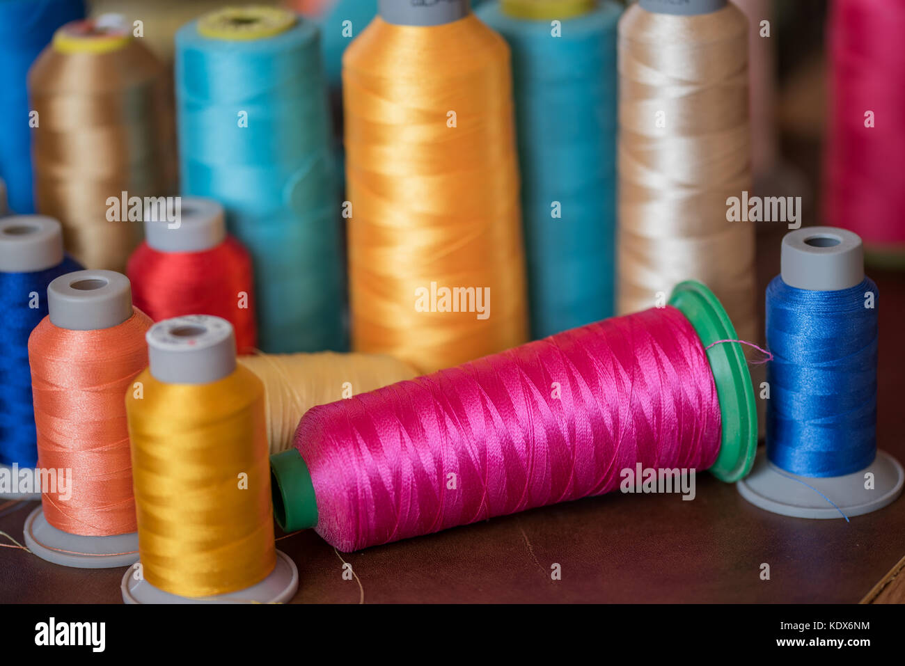 Colorful thread spools used in fabric and textile industry Stock Photo ...