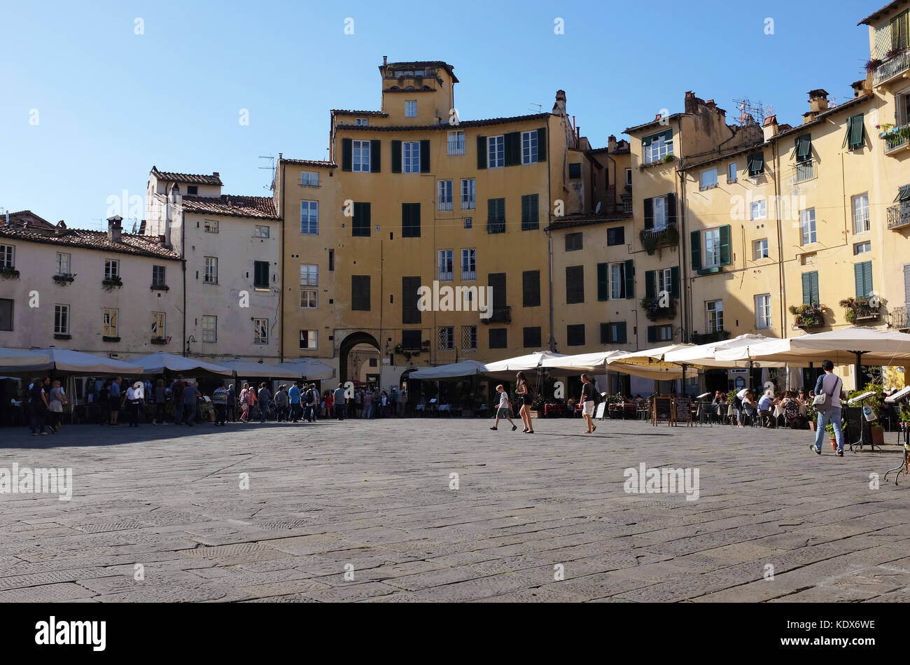 The beautiful Amphitheatre in the walled City of Lucca in the Tuscany ...