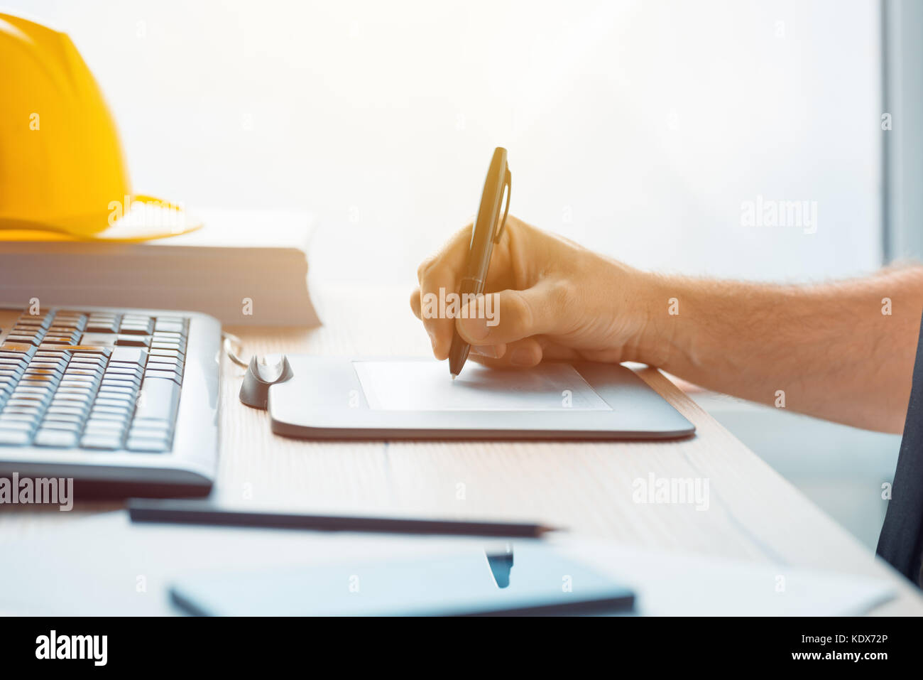 Architect construction engineer working with sketch pen tablet in ...