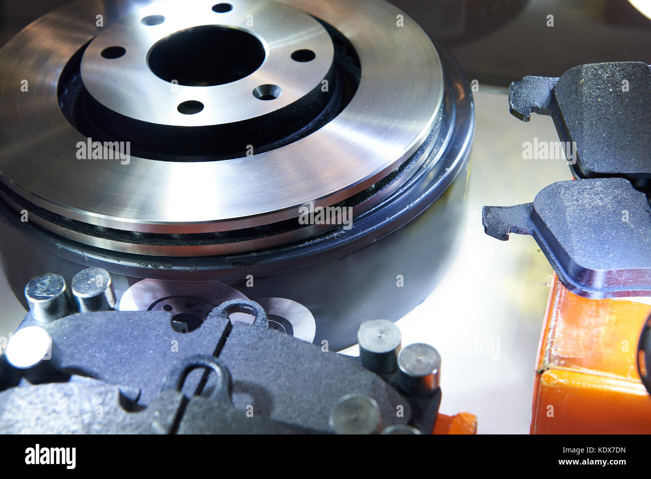 Spare parts brake disc and pads in store Stock Photo - Alamy
