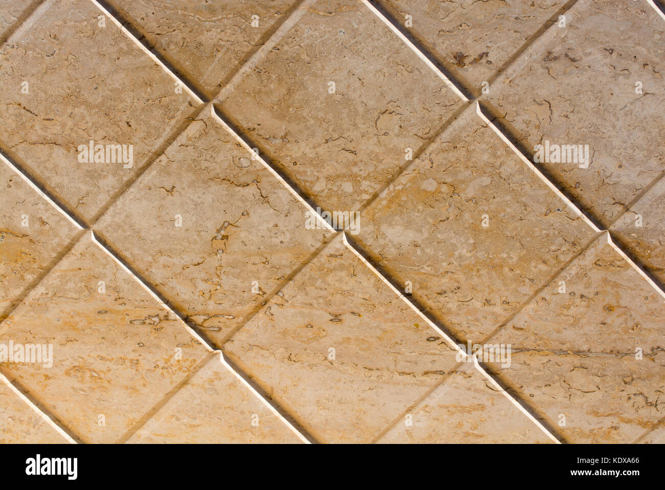 Decorative cubic stone wall as background texture Stock Photo - Alamy