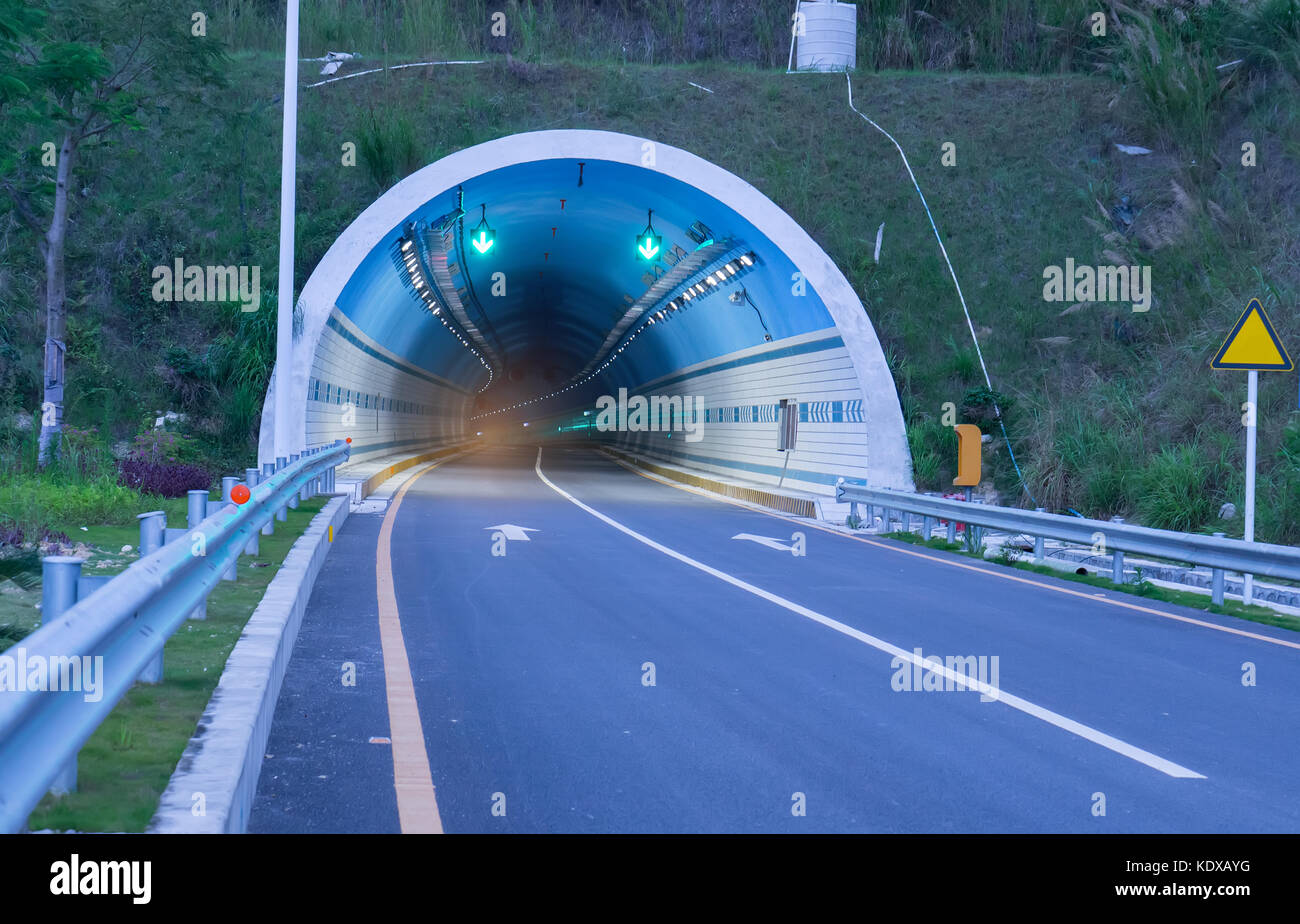 Car driving on to tunnel Stock Photo - Alamy