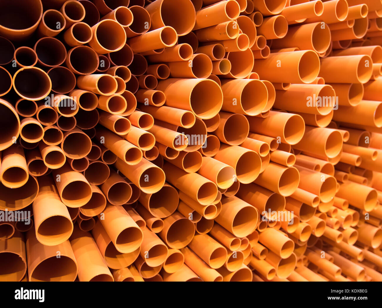 PVC pipes stacked in construction site Stock Photo - Alamy