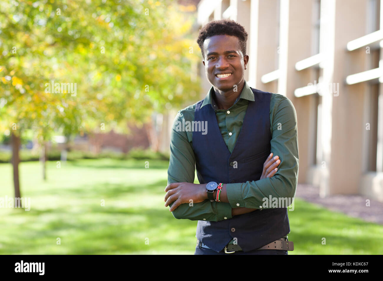 Selective focus view of a handsome confident young black student man ...